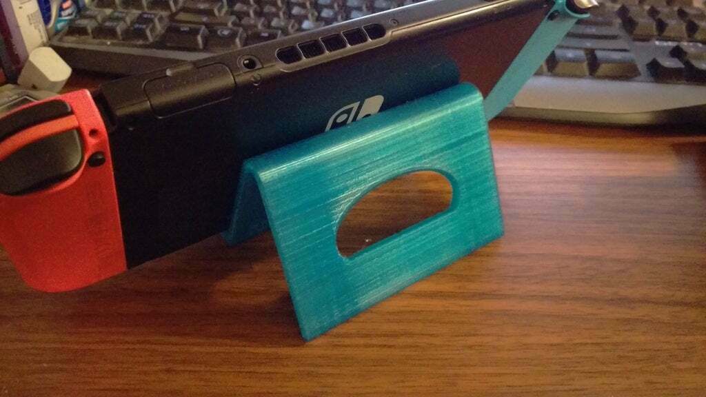 Free STL file Nintendo Switch Stand with vents and handhold・3D print ...
