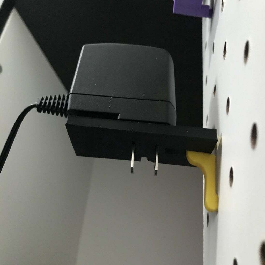 Free STL file Parametric US power plug or adapter/charger holder for ...