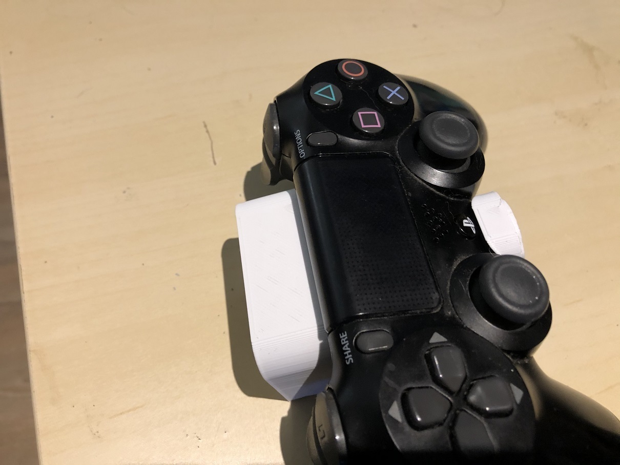 STL file Punisher Wallmount for PS4 Controller・3D printable design to ...