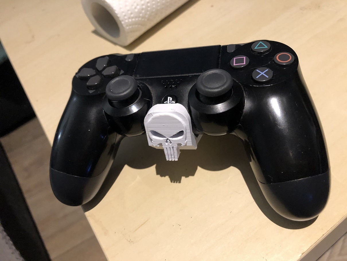 STL file Punisher Wallmount for PS4 Controller・3D printable design to ...