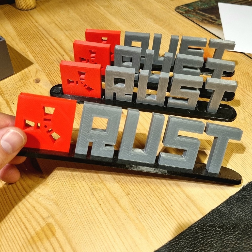 Free STL file Rust Logo Stand 🎲・Design to download and 3D print・Cults