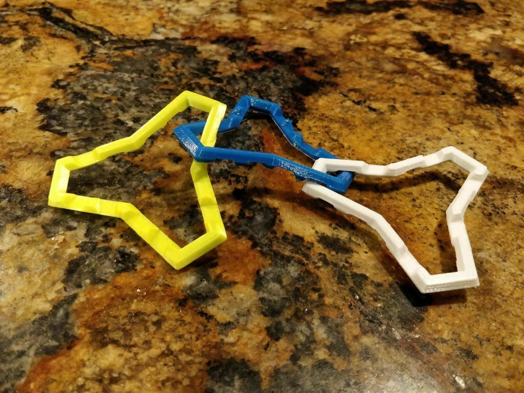 Free 3D file Multi-Material Interlocking Rings Puzzle・Design to ...