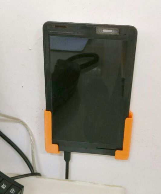 Free 3D file Fixed tablet wall mount support, just one nail (scalable ...