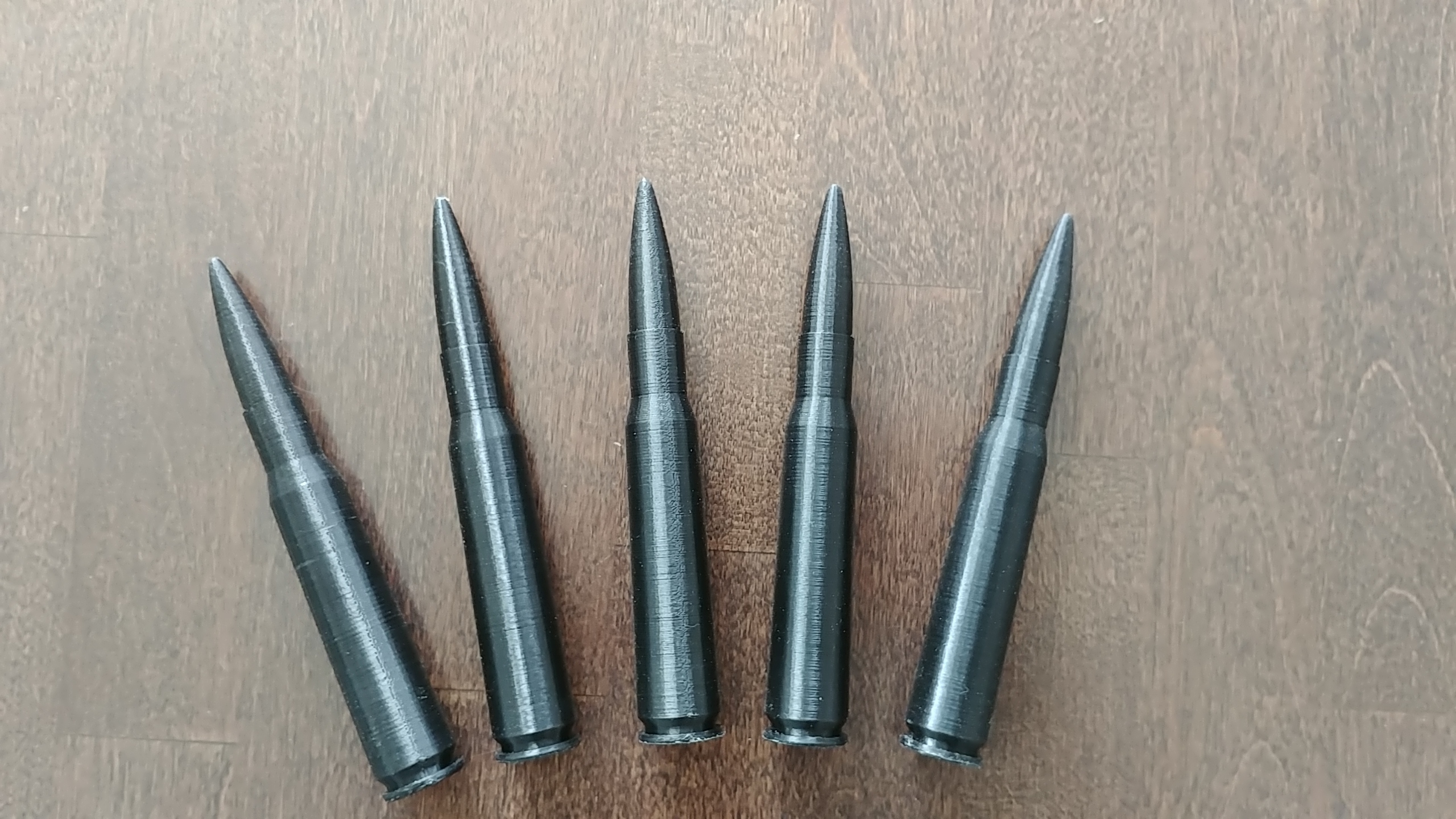 3D file .50 Cal Bullet and Belt・Design to download and 3D print・Cults