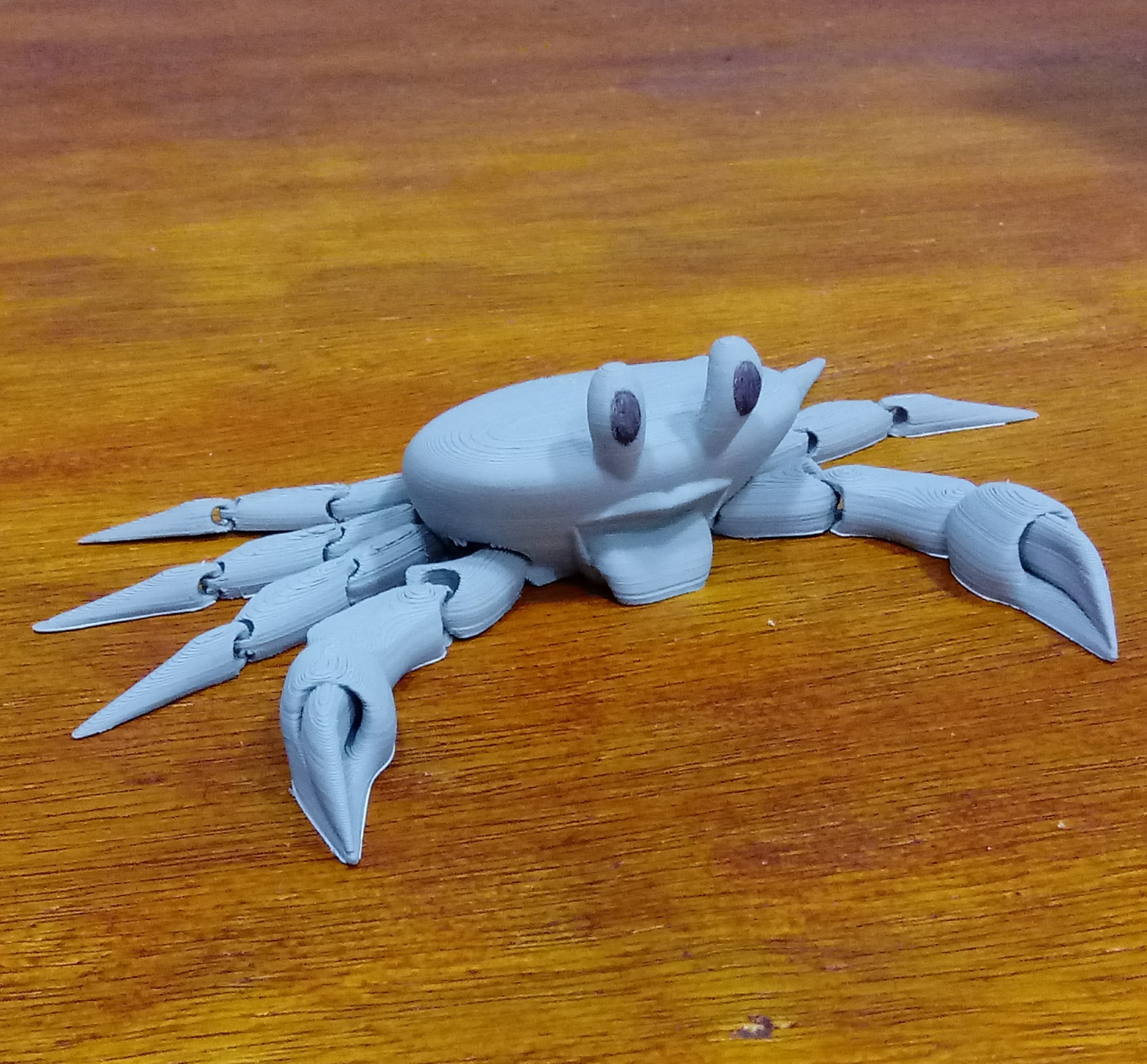 STL file flexi print crab smiling・Model to download and 3D print・Cults