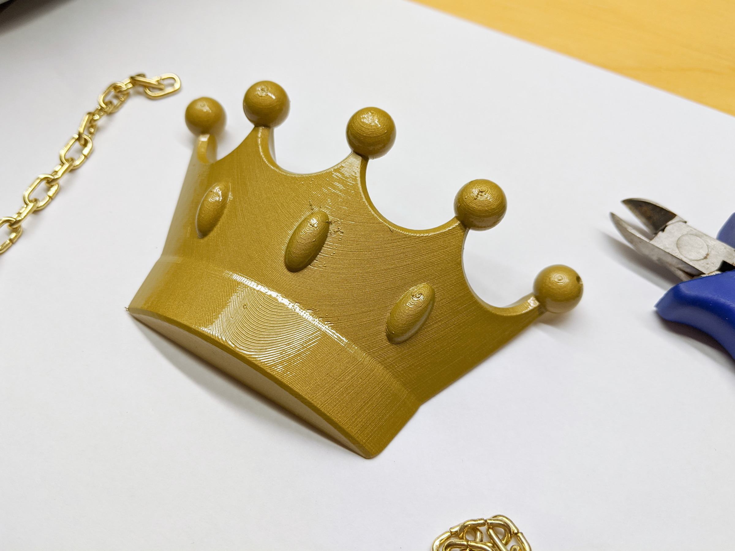 STL file Absurdly Large Crown Necklace Pendant・3D print design to ...