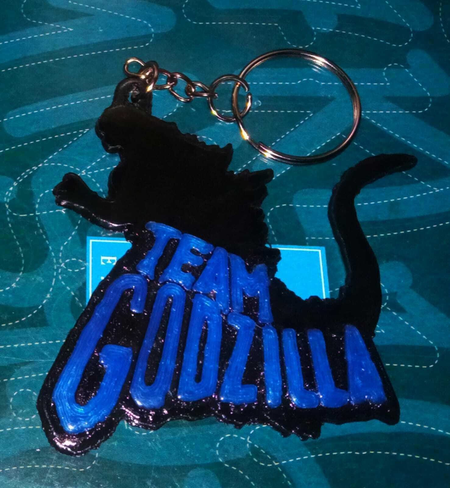 Free STL file Team Godzilla Keychain・3D printing idea to download・Cults