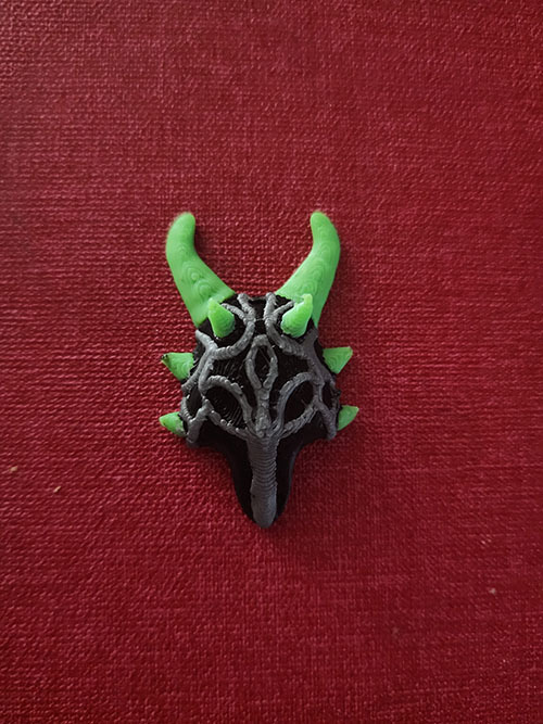 Free 3D file Dragon Mask Charm 🐉・3D printable model to download・Cults