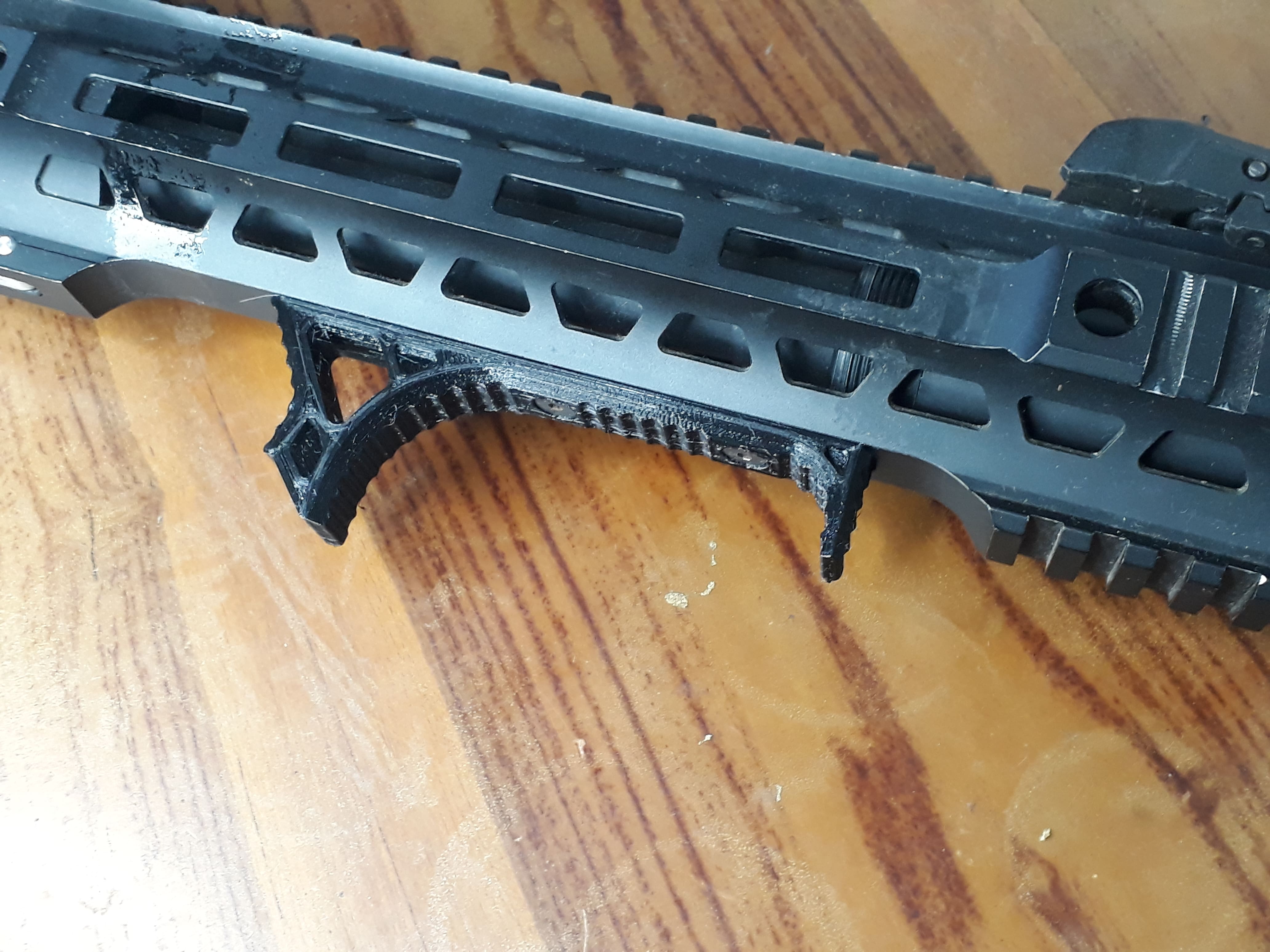 STL file Curved Link Airsoft Foregrip M-Lok 🔗・3D printer design to ...
