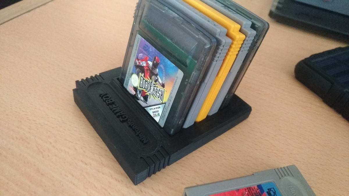 STL file Decorative Gameboy Cardridge Stand・Design to download and 3D ...