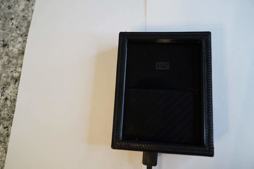 Free 3D file Western Digital My Passport Hard Drive Case・3D printable ...