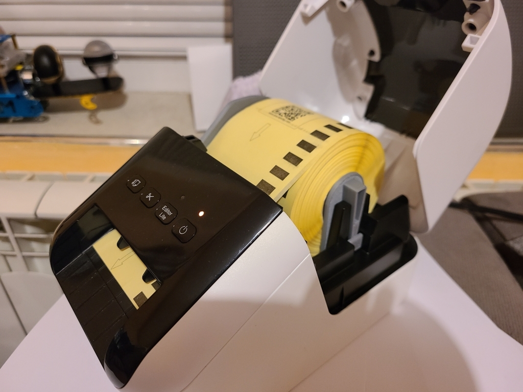 Free 3D file Brother QL-800 paper roll holder・3D printer model to ...