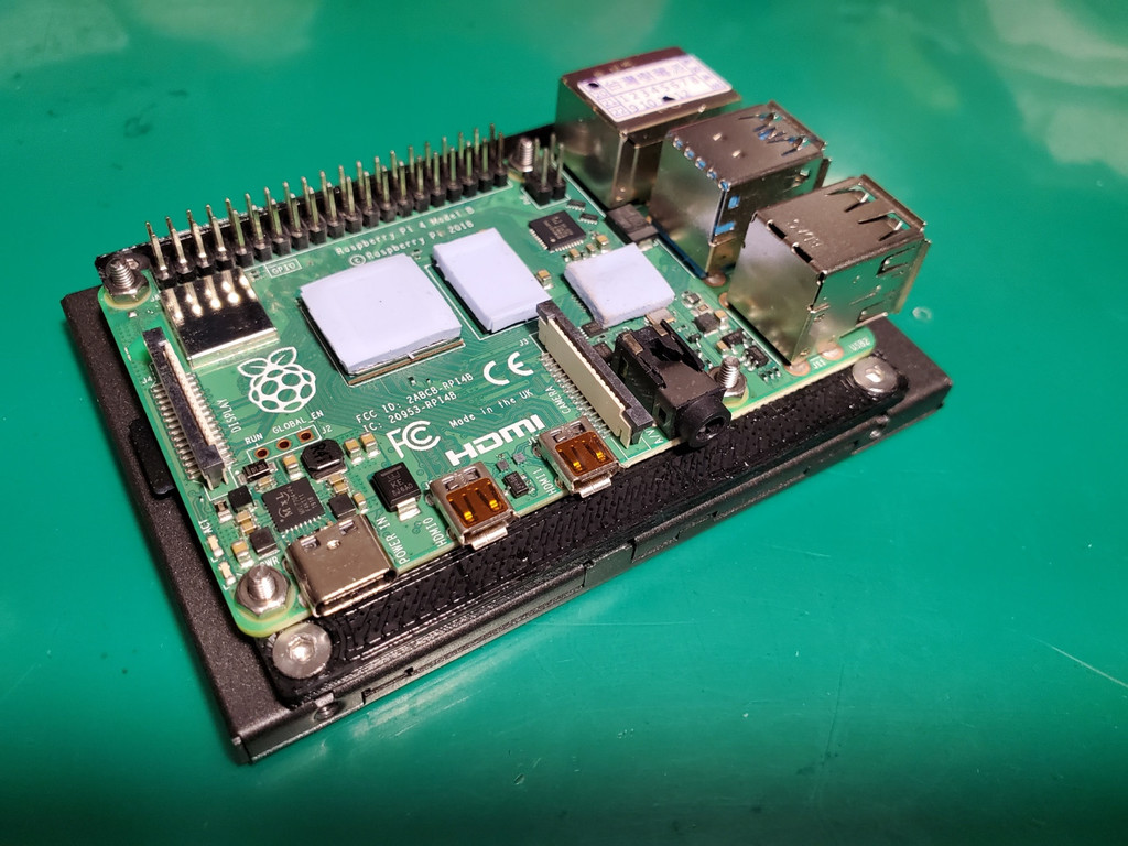 Free 3D file Raspberry Pi mount for SSD・3D printer model to download・Cults