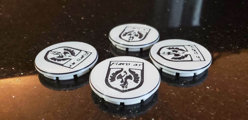 Archivo 3D gratis Pontiac Fiero centro de la rueda tapa con el emblema ...