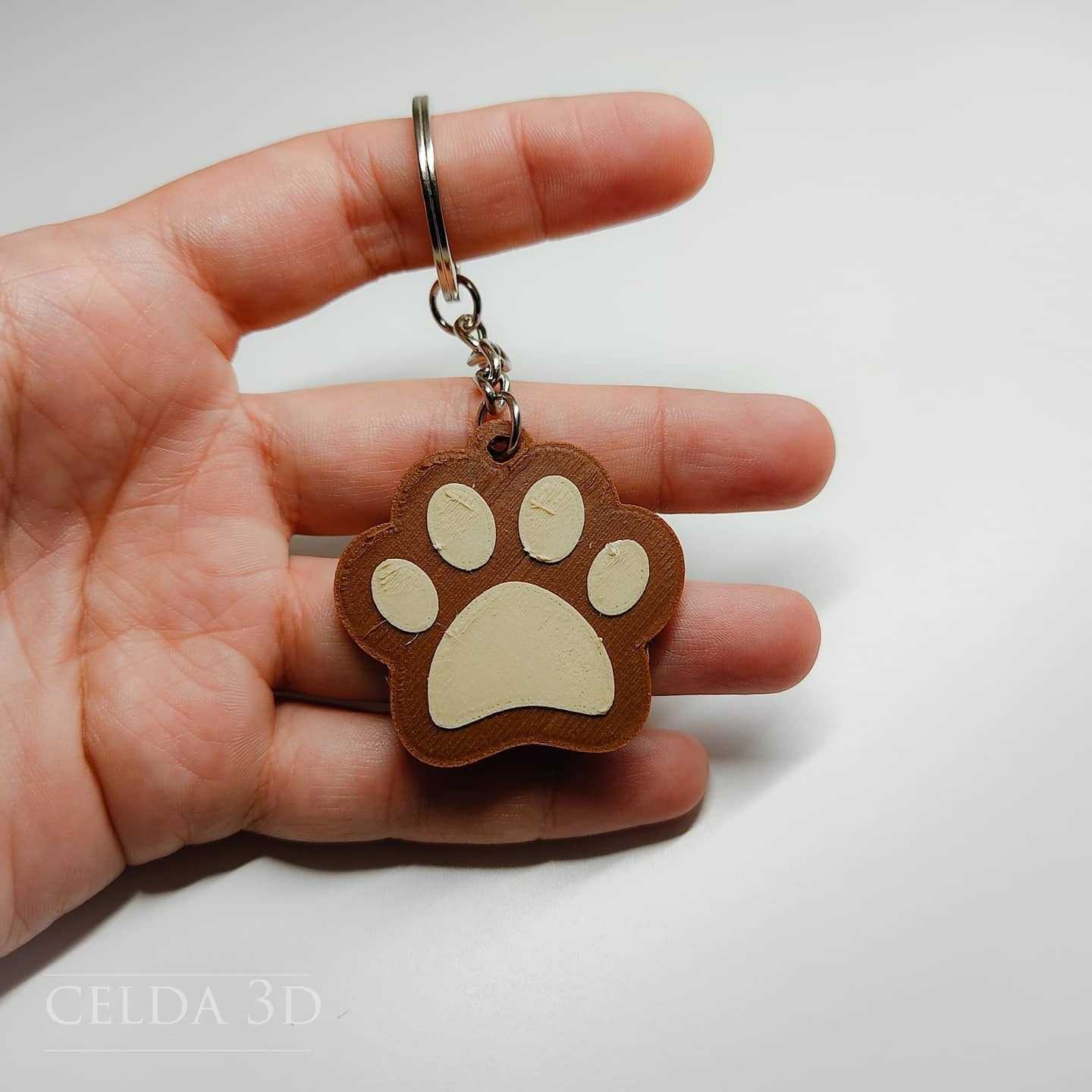 Free 3D file Paw-print keychain・3D printable model to download・Cults