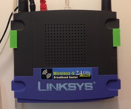 Free 3D file Linksys WRT54G Router / AP Wall Mount 🔌・3D printable model ...