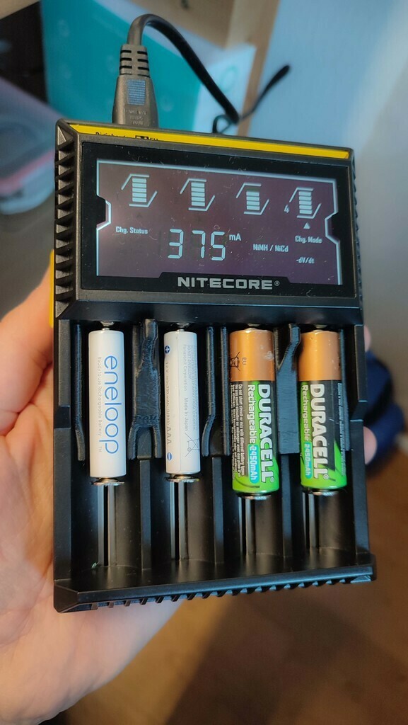 Free 3D file Nitecore D4 Digicharger AAA & AA Akku Battery Riser 🔋 ...